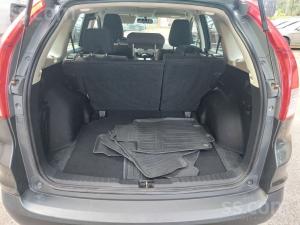 Grey Honda CR-V 2014 in Riga, with an engine capacity of 2.20 L and mileage of 0 thousand km for 8500 €, photo 12 on AUTOMOTO.COM.LV