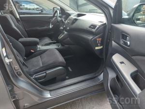 Grey Honda CR-V 2014 in Riga, with an engine capacity of 2.20 L and mileage of 0 thousand km for 8500 €, photo 14 on AUTOMOTO.COM.LV