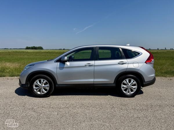 Pelēks Honda CR-V 2014 Vilkaviškis, ar dzinēja tilpumu 2.20 L un nobraukumu 277 tūkst. km par 8700 €, foto 4 vietnē AUTOMOTO.COM.LV