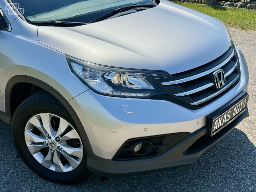 Pelēks Honda CR-V 2014 Vilkaviškis, ar dzinēja tilpumu 2.20 L un nobraukumu 277 tūkst. km par 8700 €, foto 6 vietnē AUTOMOTO.COM.LV