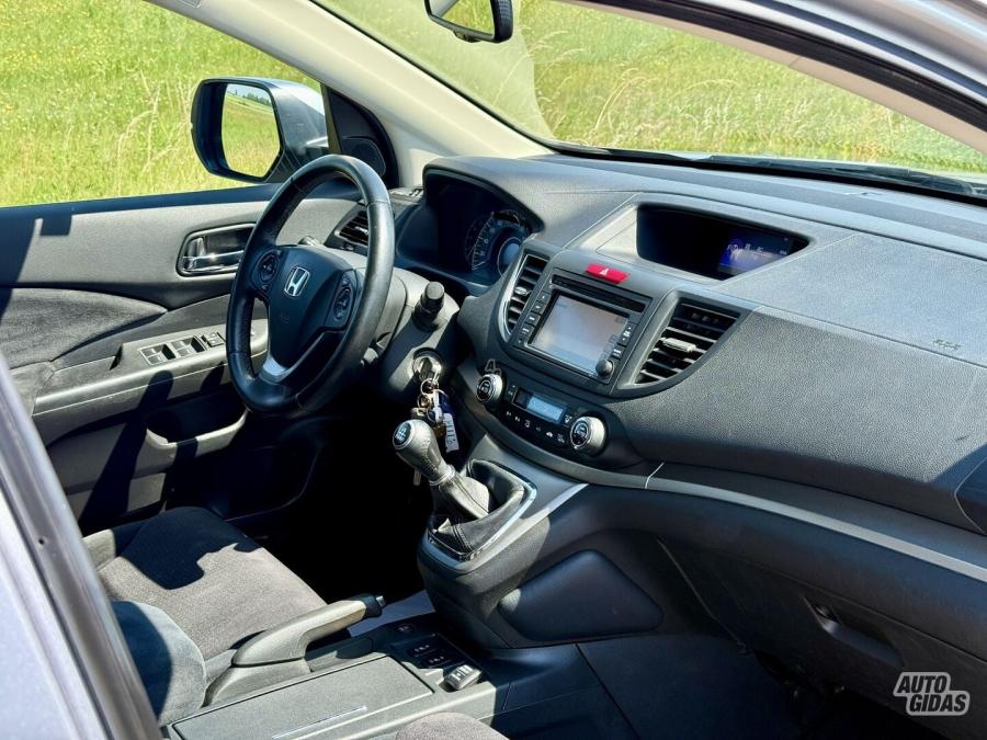 Pelēks Honda CR-V 2014 Vilkaviškis, ar dzinēja tilpumu 2.20 L un nobraukumu 277 tūkst. km par 8700 €, foto 15 vietnē AUTOMOTO.COM.LV