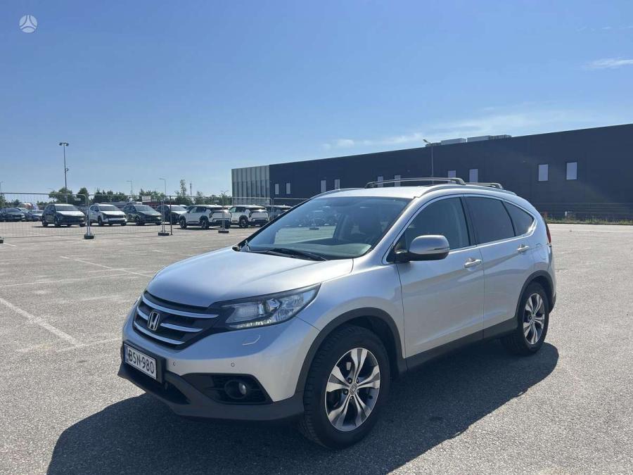 Grey Honda CR-V 2014 in Vilnius, with an engine capacity of 1.60 L and mileage of 288 thousand km for 8500 €, photo 1 on AUTOMOTO.COM.LV