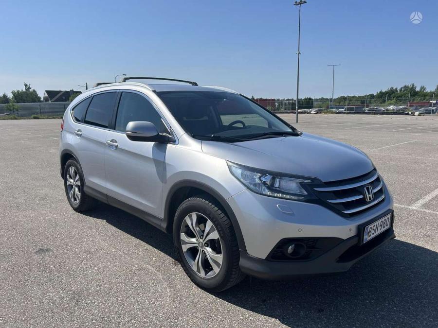 Grey Honda CR-V 2014 in Vilnius, with an engine capacity of 1.60 L and mileage of 288 thousand km for 8500 €, photo 4 on AUTOMOTO.COM.LV