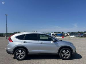 Grey Honda CR-V 2014 in Vilnius, with an engine capacity of 1.60 L and mileage of 288 thousand km for 8500 €, photo 5 on AUTOMOTO.COM.LV