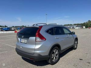 Grey Honda CR-V 2014 in Vilnius, with an engine capacity of 1.60 L and mileage of 288 thousand km for 8500 €, photo 6 on AUTOMOTO.COM.LV