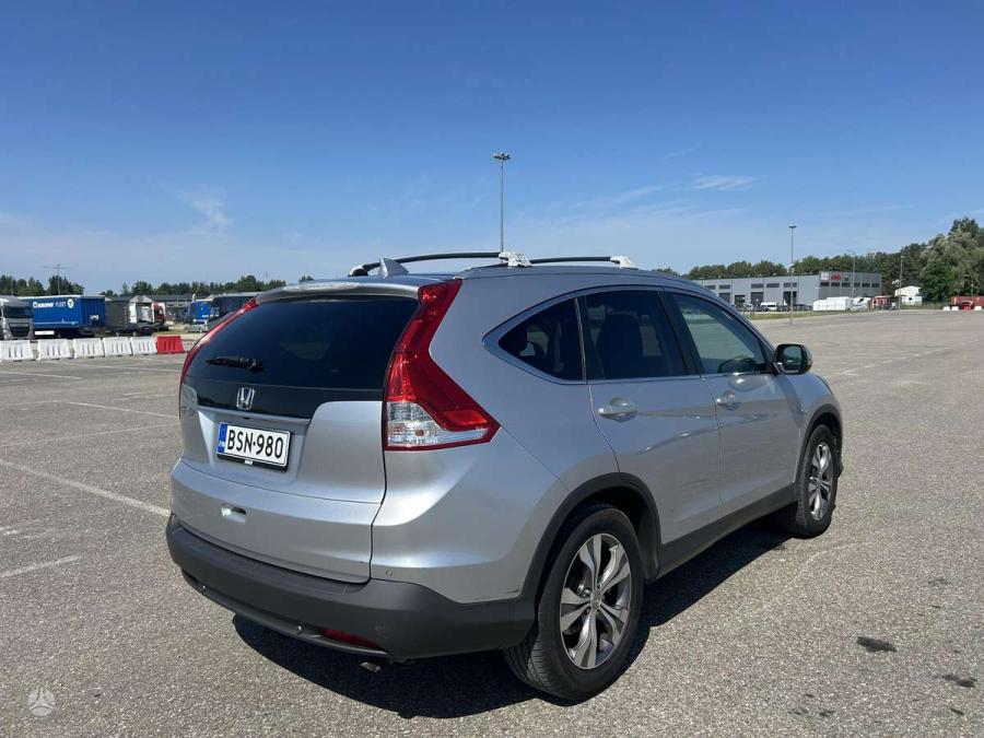 Grey Honda CR-V 2014 in Vilnius, with an engine capacity of 1.60 L and mileage of 288 thousand km for 8500 €, photo 6 on AUTOMOTO.COM.LV