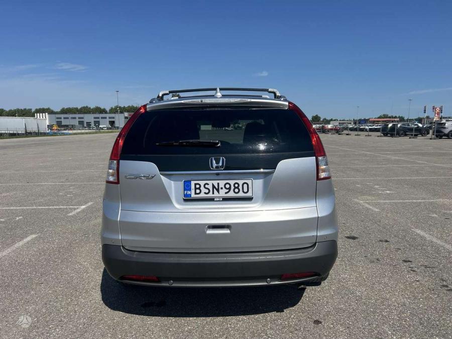 Grey Honda CR-V 2014 in Vilnius, with an engine capacity of 1.60 L and mileage of 288 thousand km for 8500 €, photo 7 on AUTOMOTO.COM.LV