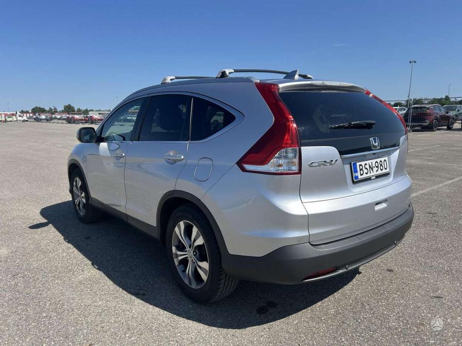 Grey Honda CR-V 2014 in Vilnius, with an engine capacity of 1.60 L and mileage of 288 thousand km for 8500 €, photo 8 on AUTOMOTO.COM.LV