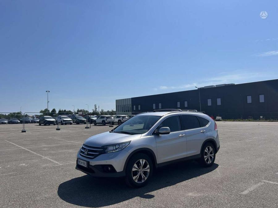 Grey Honda CR-V 2014 in Vilnius, with an engine capacity of 1.60 L and mileage of 288 thousand km for 8500 €, photo 10 on AUTOMOTO.COM.LV