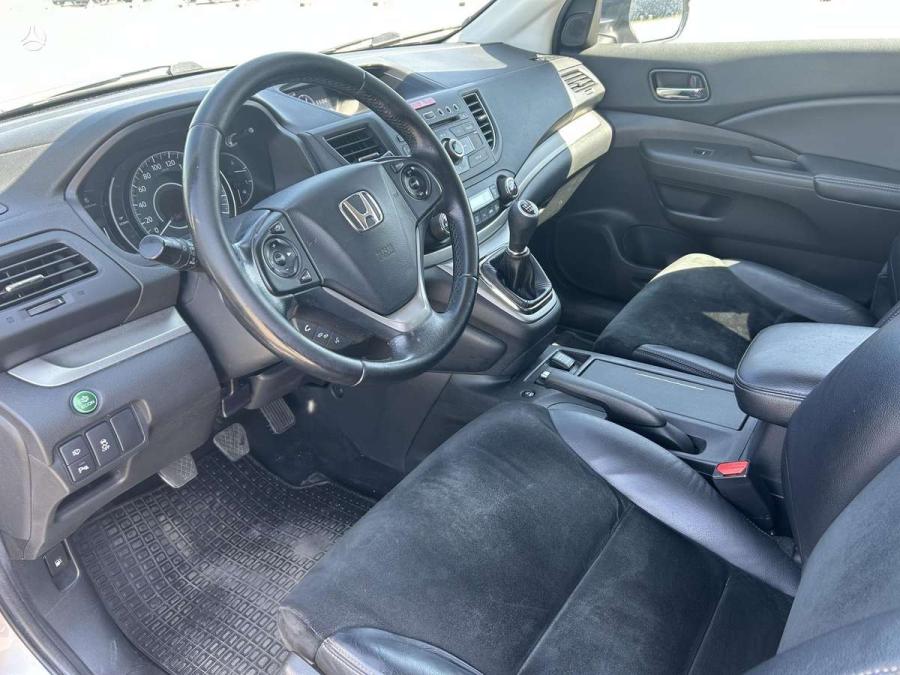 Grey Honda CR-V 2014 in Vilnius, with an engine capacity of 1.60 L and mileage of 288 thousand km for 8500 €, photo 11 on AUTOMOTO.COM.LV