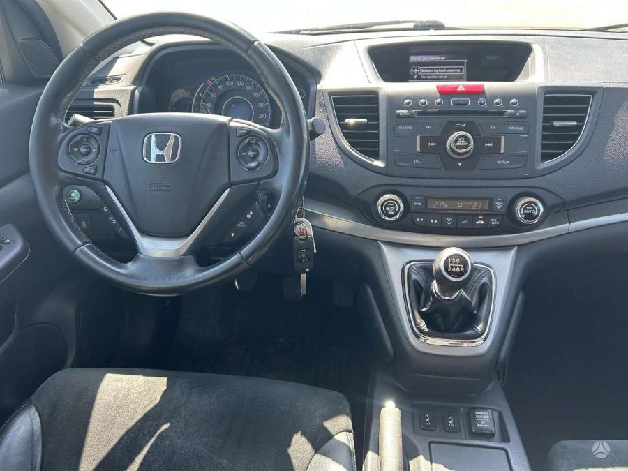 Grey Honda CR-V 2014 in Vilnius, with an engine capacity of 1.60 L and mileage of 288 thousand km for 8500 €, photo 19 on AUTOMOTO.COM.LV