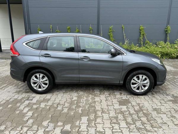 Pelēks Honda CR-V 2014 Viļņa, ar dzinēja tilpumu 1.60 L un nobraukumu 193 tūkst. km par 9850 €, foto 7 vietnē AUTOMOTO.COM.LV