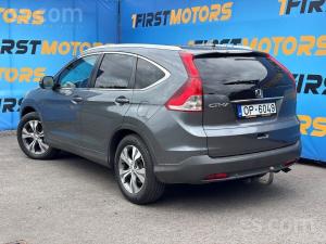 Grey Honda CR-V 2014 in Riga, with an engine capacity of 2.20 L and mileage of 274 thousand km for 9950 €, photo 3 on AUTOMOTO.COM.LV