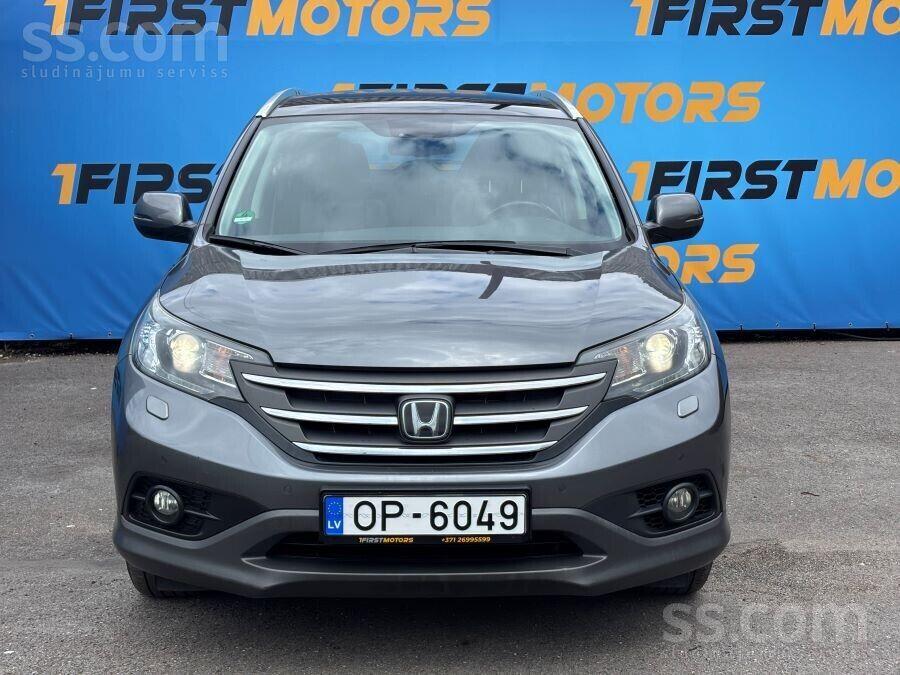 Grey Honda CR-V 2014 in Riga, with an engine capacity of 2.20 L and mileage of 274 thousand km for 9950 €, photo 4 on AUTOMOTO.COM.LV