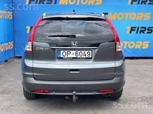 Grey Honda CR-V 2014 in Riga, with an engine capacity of 2.20 L and mileage of 274 thousand km for 9950 €, photo 5 on AUTOMOTO.COM.LV