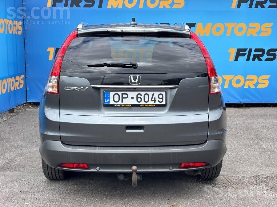 Grey Honda CR-V 2014 in Riga, with an engine capacity of 2.20 L and mileage of 274 thousand km for 9950 €, photo 5 on AUTOMOTO.COM.LV