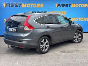 Grey Honda CR-V 2014 in Riga, with an engine capacity of 2.20 L and mileage of 274 thousand km for 9950 €, photo 7 on AUTOMOTO.COM.LV