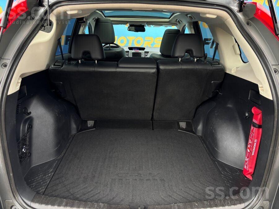 Grey Honda CR-V 2014 in Riga, with an engine capacity of 2.20 L and mileage of 274 thousand km for 9950 €, photo 10 on AUTOMOTO.COM.LV