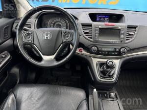 Grey Honda CR-V 2014 in Riga, with an engine capacity of 2.20 L and mileage of 274 thousand km for 9950 €, photo 14 on AUTOMOTO.COM.LV