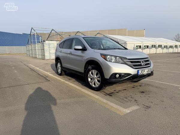Grey Honda CR-V 2014 in Kaunas, with an engine capacity of 2.40 L and mileage of 95 thousand km for 11000 €, photo 2 on AUTOMOTO.COM.LV