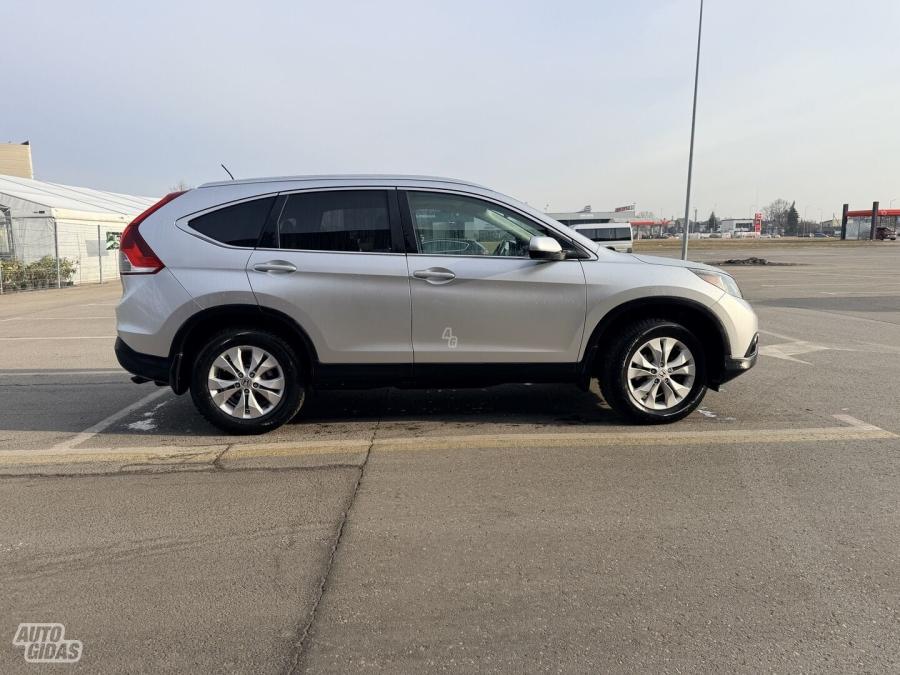 Grey Honda CR-V 2014 in Kaunas, with an engine capacity of 2.40 L and mileage of 95 thousand km for 11000 €, photo 4 on AUTOMOTO.COM.LV