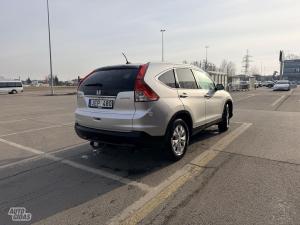 Grey Honda CR-V 2014 in Kaunas, with an engine capacity of 2.40 L and mileage of 95 thousand km for 11000 €, photo 5 on AUTOMOTO.COM.LV