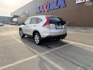 Grey Honda CR-V 2014 in Kaunas, with an engine capacity of 2.40 L and mileage of 95 thousand km for 11000 €, photo 6 on AUTOMOTO.COM.LV