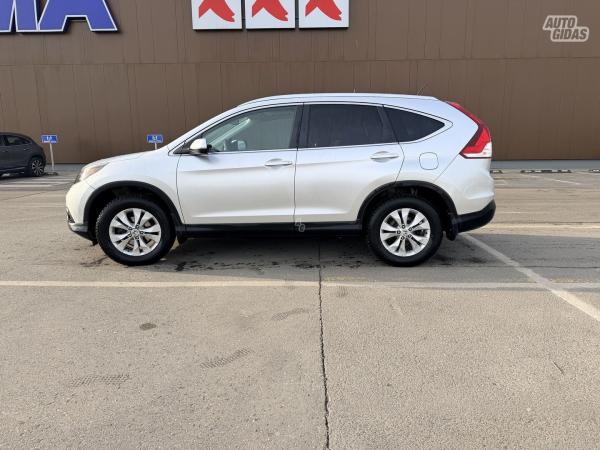 Grey Honda CR-V 2014 in Kaunas, with an engine capacity of 2.40 L and mileage of 95 thousand km for 11000 €, photo 6 on AUTOMOTO.COM.LV