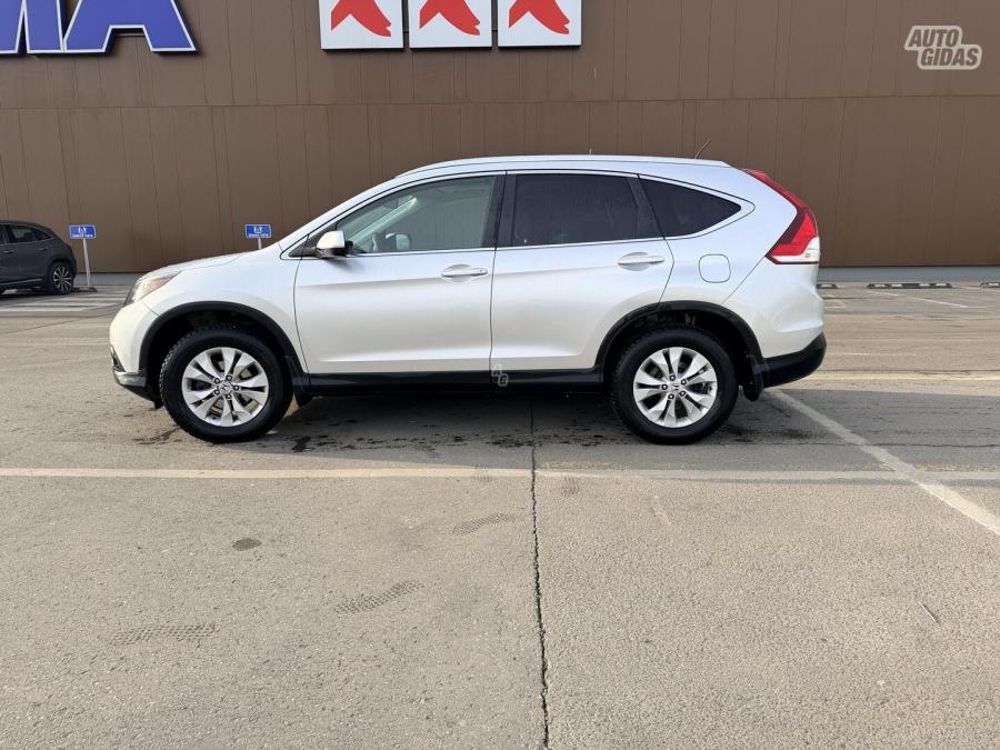 Grey Honda CR-V 2014 in Kaunas, with an engine capacity of 2.40 L and mileage of 95 thousand km for 11000 €, photo 7 on AUTOMOTO.COM.LV