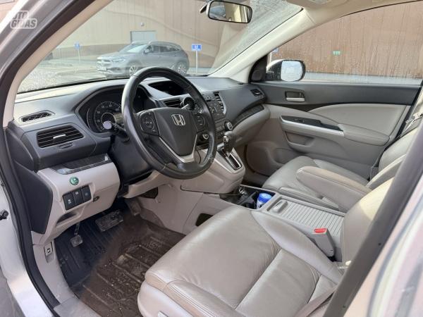 Grey Honda CR-V 2014 in Kaunas, with an engine capacity of 2.40 L and mileage of 95 thousand km for 11000 €, photo 9 on AUTOMOTO.COM.LV