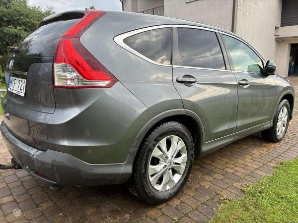 Pelēks Honda CR-V 2014 Viļņa, ar dzinēja tilpumu 2.20 L un nobraukumu 269 tūkst. km par 10500 €, foto 2 vietnē AUTOMOTO.COM.LV