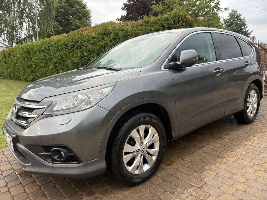 Grey Honda CR-V 2014 in Vilnius, with an engine capacity of 2.20 L and mileage of 269 thousand km for 10500 €, photo 6 on AUTOMOTO.COM.LV