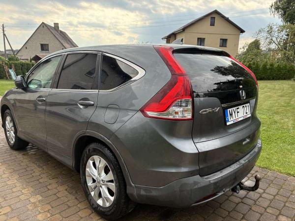 Pelēks Honda CR-V 2014 Viļņa, ar dzinēja tilpumu 2.20 L un nobraukumu 269 tūkst. km par 10500 €, foto 7 vietnē AUTOMOTO.COM.LV