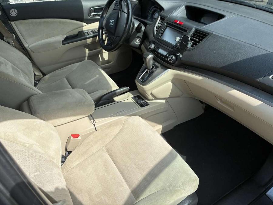 Grey Honda CR-V 2014 in Vilnius, with an engine capacity of 2.20 L and mileage of 269 thousand km for 10500 €, photo 11 on AUTOMOTO.COM.LV