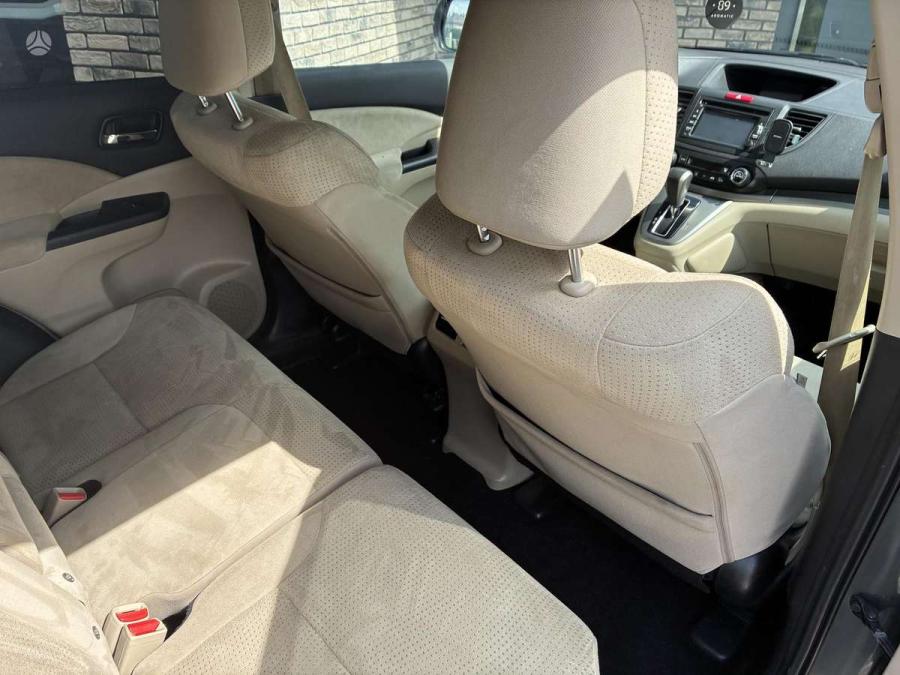 Grey Honda CR-V 2014 in Vilnius, with an engine capacity of 2.20 L and mileage of 269 thousand km for 10500 €, photo 12 on AUTOMOTO.COM.LV