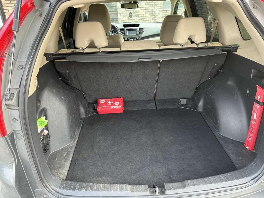 Grey Honda CR-V 2014 in Vilnius, with an engine capacity of 2.20 L and mileage of 269 thousand km for 10500 €, photo 13 on AUTOMOTO.COM.LV
