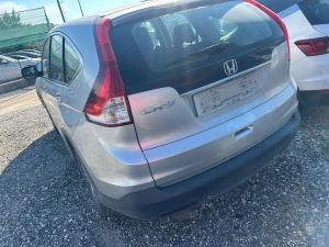 Grey Honda CR-V 2014 in Telschi, with an engine capacity of 1.60 L and mileage of 219 thousand km for 3300 €, photo 3 on AUTOMOTO.COM.LV
