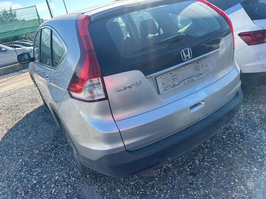 Grey Honda CR-V 2014 in Telschi, with an engine capacity of 1.60 L and mileage of 219 thousand km for 3300 €, photo 3 on AUTOMOTO.COM.LV