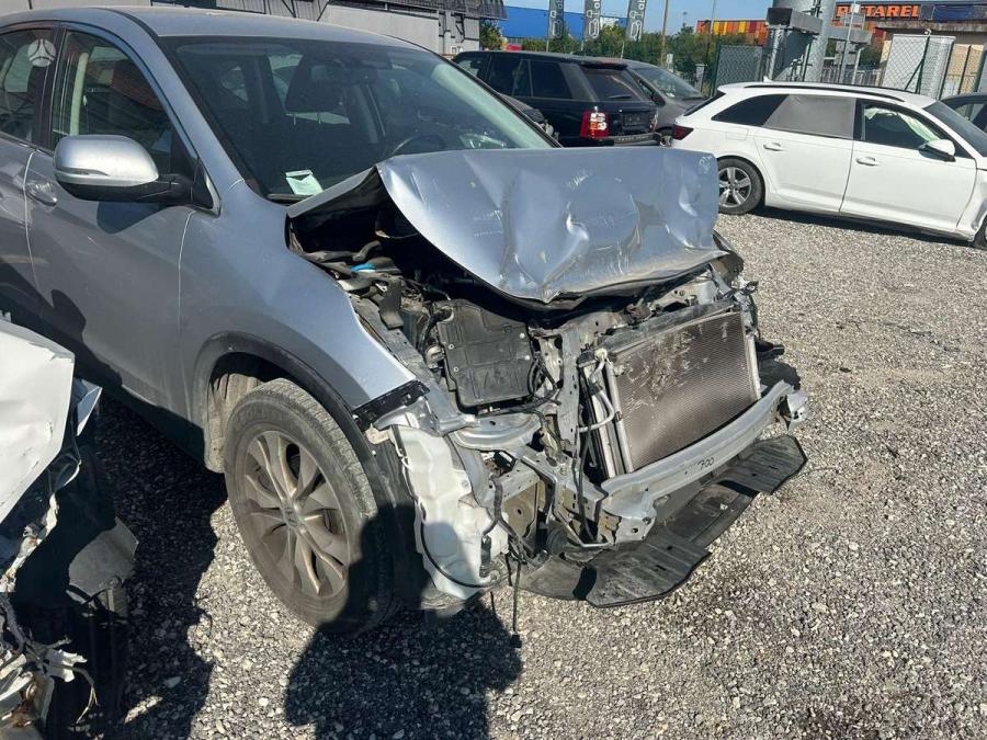 Grey Honda CR-V 2014 in Telschi, with an engine capacity of 1.60 L and mileage of 219 thousand km for 3300 €, photo 5 on AUTOMOTO.COM.LV