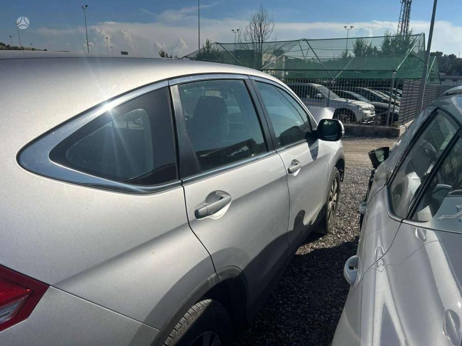 Grey Honda CR-V 2014 in Telschi, with an engine capacity of 1.60 L and mileage of 219 thousand km for 3300 €, photo 6 on AUTOMOTO.COM.LV