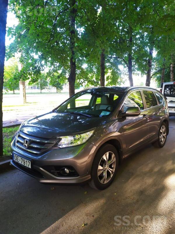 Pelēks Honda CR-V 2014 Rīga, ar dzinēja tilpumu 2.20 L un nobraukumu 194 tūkst. km par 10800 €, foto 1 vietnē AUTOMOTO.COM.LV