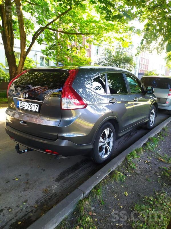 Pelēks Honda CR-V 2014 Rīga, ar dzinēja tilpumu 2.20 L un nobraukumu 194 tūkst. km par 10800 €, foto 4 vietnē AUTOMOTO.COM.LV