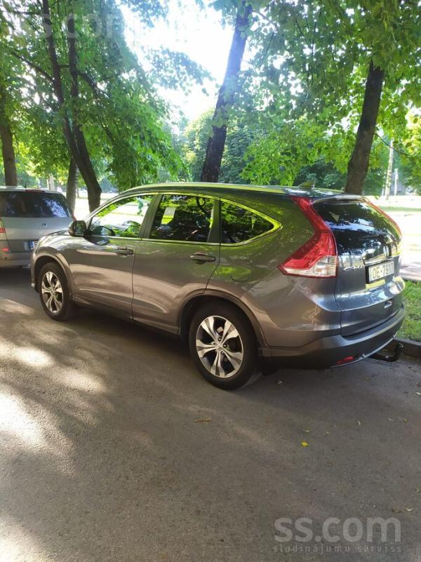 Pelēks Honda CR-V 2014 Rīga, ar dzinēja tilpumu 2.20 L un nobraukumu 194 tūkst. km par 10800 €, foto 5 vietnē AUTOMOTO.COM.LV