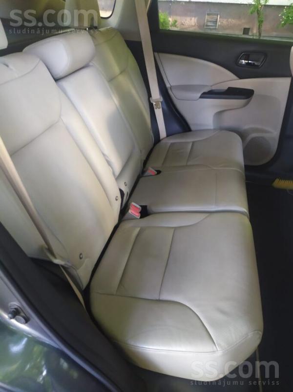 Pelēks Honda CR-V 2014 Rīga, ar dzinēja tilpumu 2.20 L un nobraukumu 194 tūkst. km par 10800 €, foto 7 vietnē AUTOMOTO.COM.LV