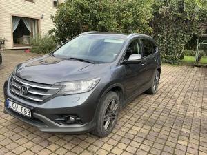 Grey Honda CR-V 2014 in Klaipeda, with an engine capacity of 2.20 L and mileage of 180 thousand km for 12000 €, photo 3 on AUTOMOTO.COM.LV