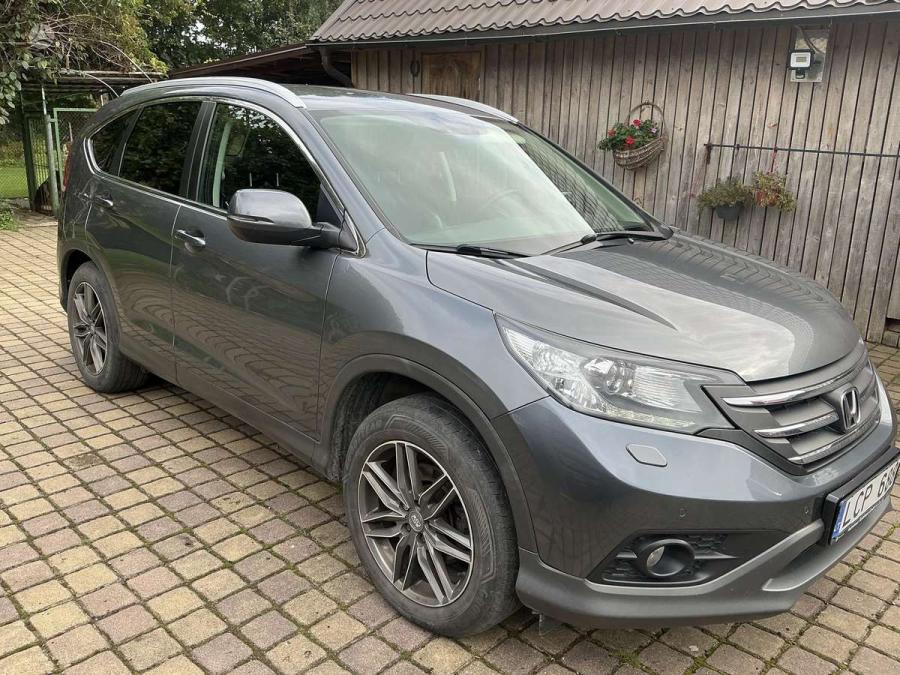 Grey Honda CR-V 2014 in Klaipeda, with an engine capacity of 2.20 L and mileage of 180 thousand km for 12000 €, photo 4 on AUTOMOTO.COM.LV