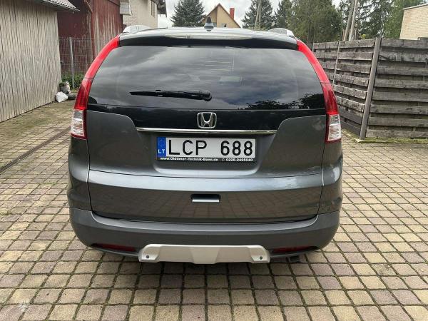 Pelēks Honda CR-V 2014 Klaipėda, ar dzinēja tilpumu 2.20 L un nobraukumu 180 tūkst. km par 12000 €, foto 5 vietnē AUTOMOTO.COM.LV