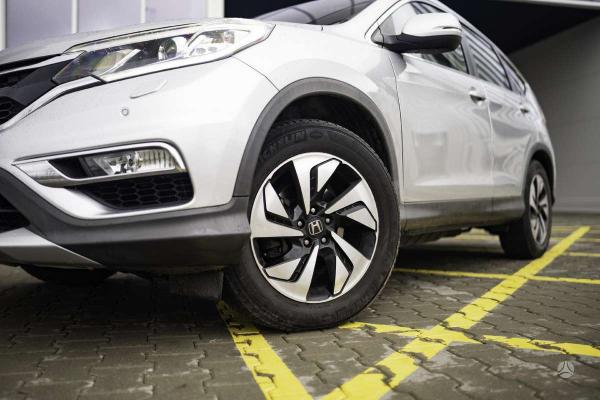 Grey Honda CR-V 2015 in Vilnius, with an engine capacity of 1.60 L and mileage of 262 thousand km for 11999 €, photo 11 on AUTOMOTO.COM.LV