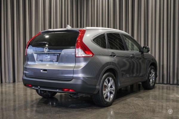 Grey Honda CR-V 2015 in Marijampole, with an engine capacity of 2.20 L and mileage of 176 thousand km for 11950 €, photo 11 on AUTOMOTO.COM.LV