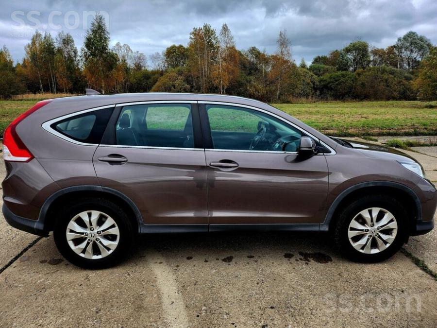 Pelēks Honda CR-V 2015 Rīga, ar dzinēja tilpumu 1.60 L un nobraukumu 241 tūkst. km par 9500 €, foto 8 vietnē AUTOMOTO.COM.LV